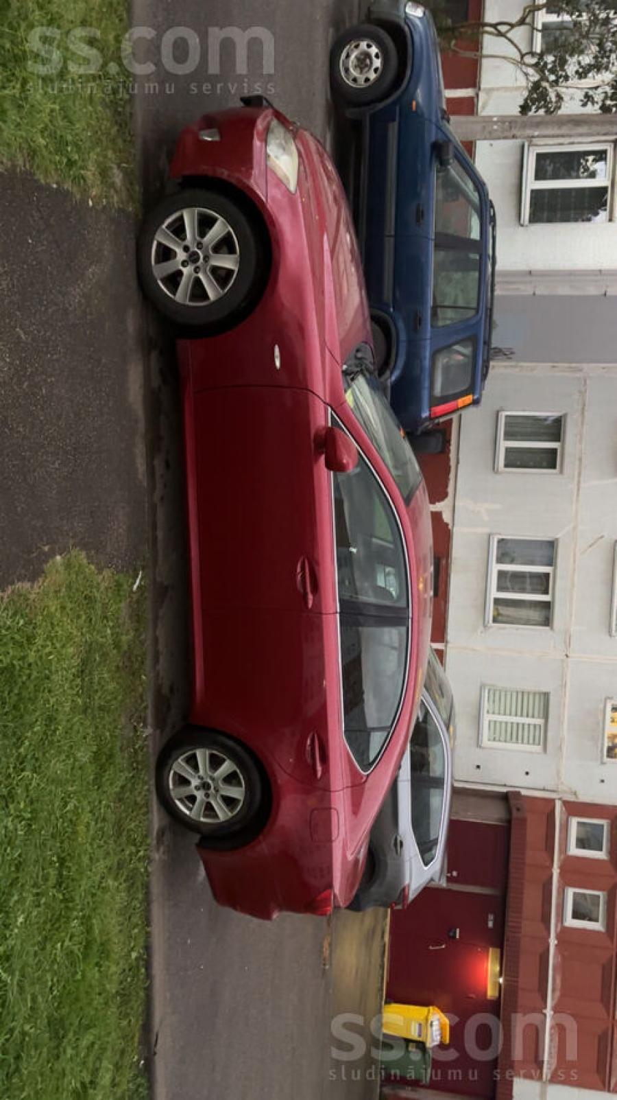 Red Lexus IS 2006 in Riga, with an engine capacity of 2.20 L and mileage of 287 thousand km for 2100 €, photo 1 on AUTOMOTO.COM.LV