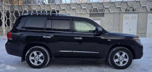 Black Lexus LX 570 2009 in Vilnius, with an engine capacity of 5.70 L and mileage of 209 thousand km for 25400 €, photo 8 on AUTOMOTO.COM.LV