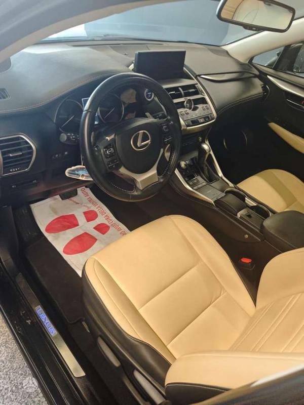 Black Lexus NX 300h 2020 in Vilnius, with an engine capacity of 2.49 L and mileage of 107 thousand km for 28888 €, photo 6 on AUTOMOTO.COM.LV
