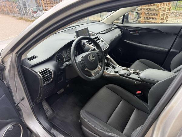 Brown Lexus NX 300h 2014 in Kaunas, with an engine capacity of 2.49 L and mileage of 260 thousand km for 12900 €, photo 9 on AUTOMOTO.COM.LV