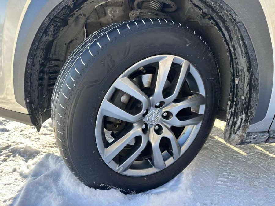 Brown Lexus NX 300h 2016 in Kaunas, with an engine capacity of 2.49 L and mileage of 186 thousand km for 19600 €, photo 23 on AUTOMOTO.COM.LV