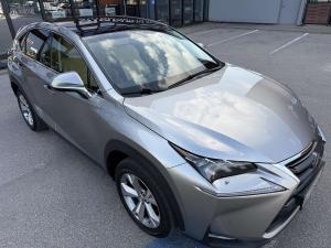 Brown Lexus NX 300h 2017 in Kaunas, with an engine capacity of 2.49 L and mileage of 206 thousand km for 21555 €, photo 6 on AUTOMOTO.COM.LV