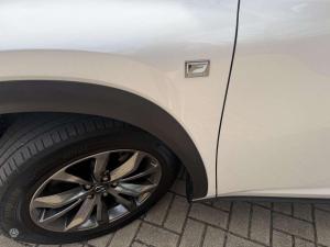 White Lexus NX 300h 2014 in Siauliai, with an engine capacity of 2.49 L and mileage of 286 thousand km for 19400 €, photo 9 on AUTOMOTO.COM.LV