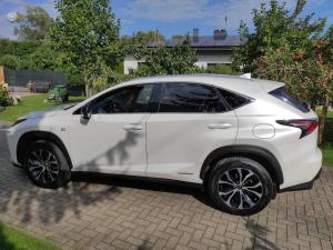 White Lexus NX 300h 2014 in Kaunas, with an engine capacity of 2.49 L and mileage of 214 thousand km for 19950 €, photo 7 on AUTOMOTO.COM.LV