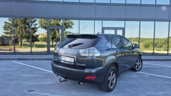 Black Lexus RX 400h 2006 in Klaipeda, with an engine capacity of 3.31 L and mileage of 415 thousand km for 2499 €, photo 2 on AUTOMOTO.COM.LV