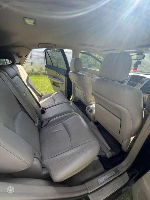 Black Lexus RX 400h 2007 in Vilnius, with an engine capacity of 3.31 L and mileage of 300 thousand km for 2900 €, photo 6 on AUTOMOTO.COM.LV