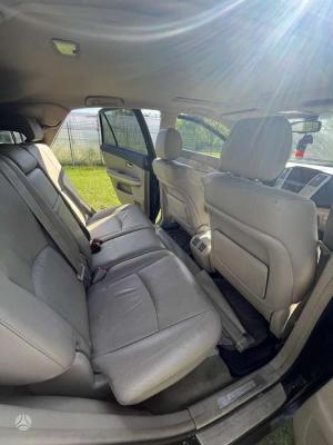 Black Lexus RX 400h 2007 in Vilnius, with an engine capacity of 3.31 L and mileage of 300 thousand km for 2900 €, photo 6 on AUTOMOTO.COM.LV