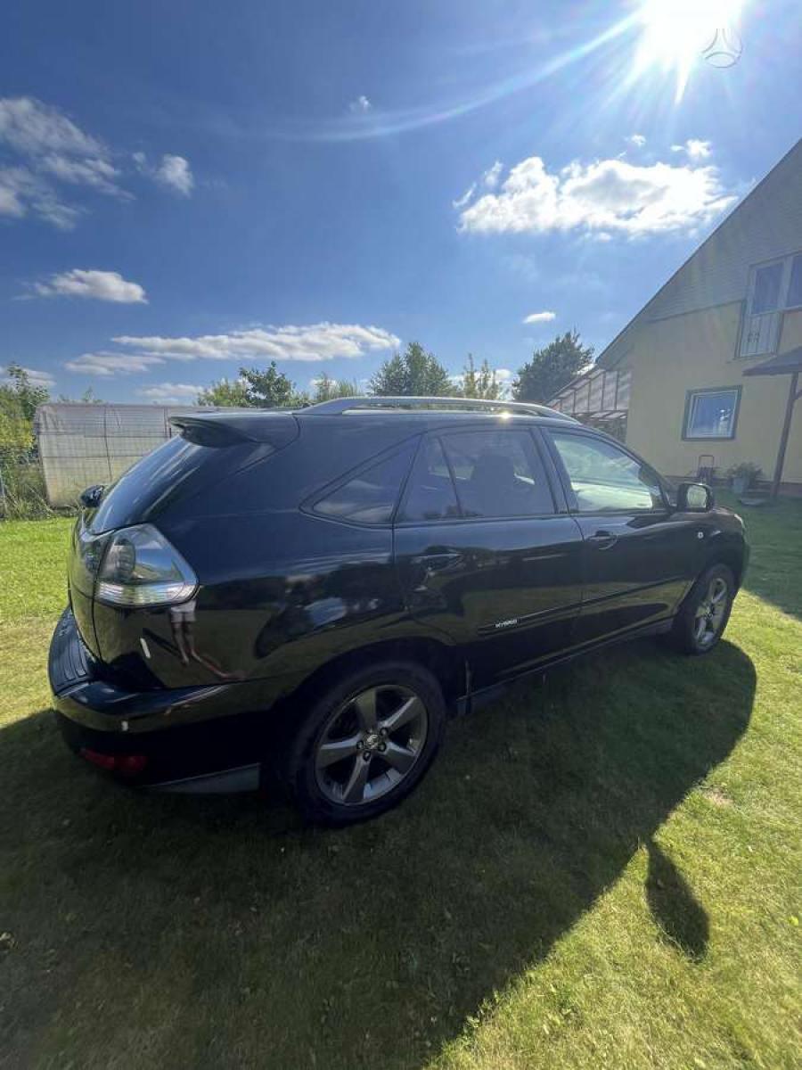 Black Lexus RX 400h 2007 in Vilnius, with an engine capacity of 3.31 L and mileage of 300 thousand km for 2900 €, photo 7 on AUTOMOTO.COM.LV
