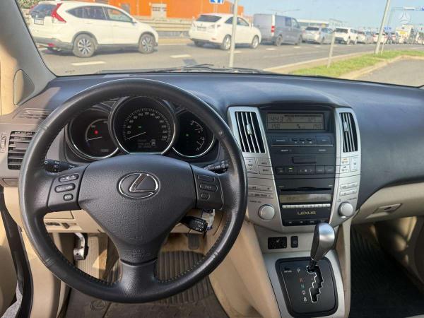 Black Lexus RX 400h 2007 in Vilnius, with an engine capacity of 3.31 L and mileage of 237 thousand km for 4850 €, photo 9 on AUTOMOTO.COM.LV