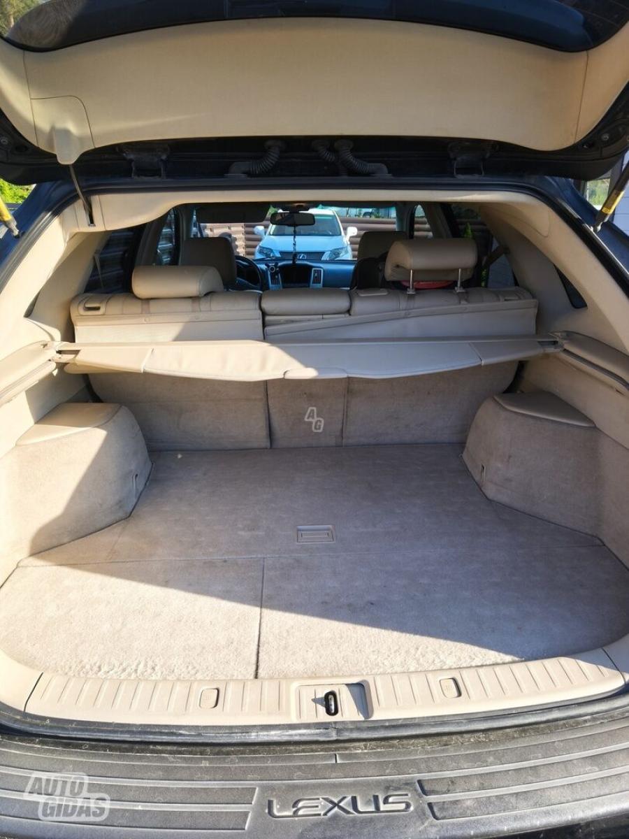 Black Lexus RX 400h 2008 in Vilnius, with an engine capacity of 3.30 L and mileage of 270 thousand km for 7400 €, photo 6 on AUTOMOTO.COM.LV