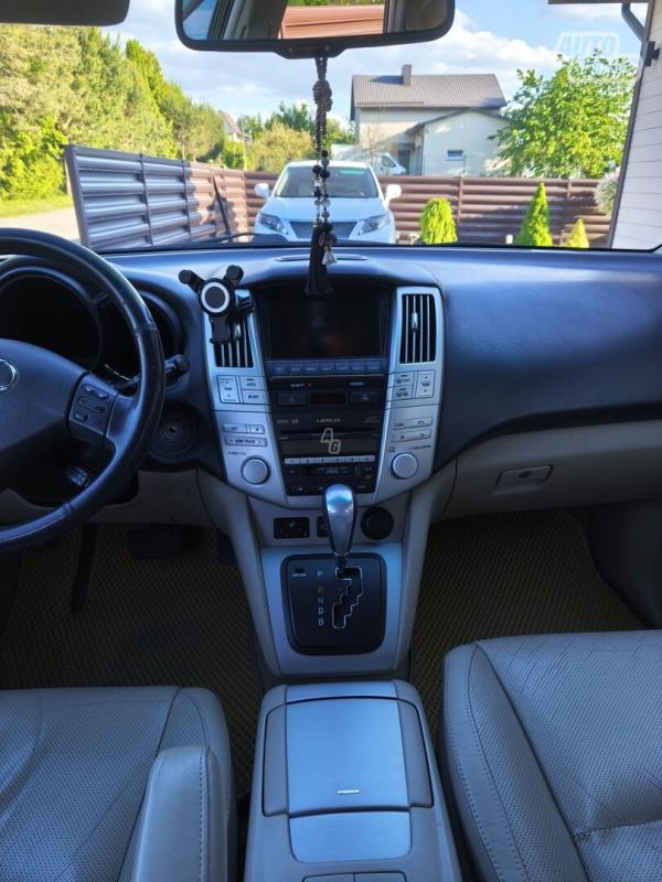 Black Lexus RX 400h 2008 in Vilnius, with an engine capacity of 3.30 L and mileage of 270 thousand km for 7400 €, photo 7 on AUTOMOTO.COM.LV