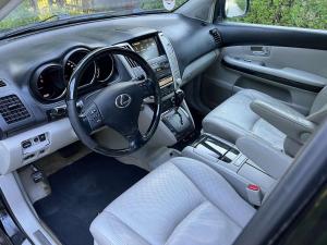 Black Lexus RX 400h 2008 in Vilnius, with an engine capacity of 3.30 L and mileage of 308 thousand km for 4499 €, photo 13 on AUTOMOTO.COM.LV