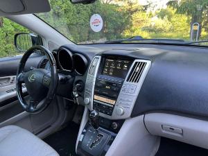 Black Lexus RX 400h 2008 in Vilnius, with an engine capacity of 3.30 L and mileage of 308 thousand km for 4499 €, photo 18 on AUTOMOTO.COM.LV