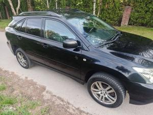 Black Lexus RX 400h 2009 in Vilnius, with an engine capacity of 3.30 L and mileage of 405 thousand km for 5300 €, photo 4 on AUTOMOTO.COM.LV