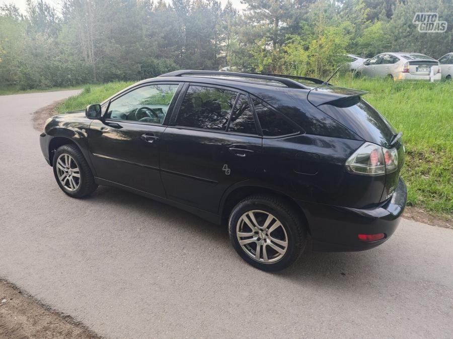 Black Lexus RX 400h 2009 in Vilnius, with an engine capacity of 3.30 L and mileage of 405 thousand km for 5300 €, photo 6 on AUTOMOTO.COM.LV