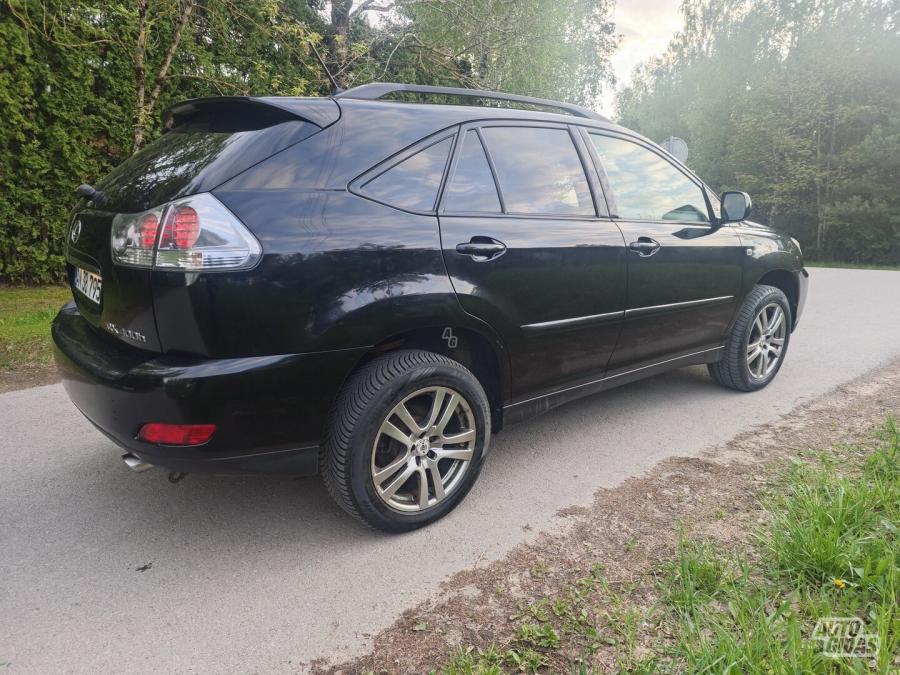 Black Lexus RX 400h 2009 in Vilnius, with an engine capacity of 3.30 L and mileage of 405 thousand km for 5300 €, photo 7 on AUTOMOTO.COM.LV
