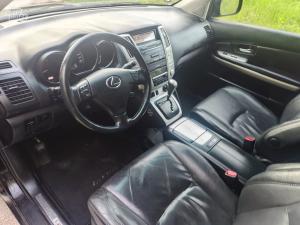 Black Lexus RX 400h 2009 in Vilnius, with an engine capacity of 3.30 L and mileage of 405 thousand km for 5300 €, photo 8 on AUTOMOTO.COM.LV