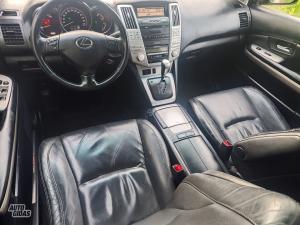 Black Lexus RX 400h 2009 in Vilnius, with an engine capacity of 3.30 L and mileage of 405 thousand km for 5300 €, photo 9 on AUTOMOTO.COM.LV