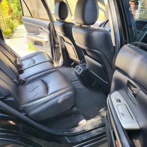 Black Lexus RX 400h 2009 in Trakai, with an engine capacity of 3.30 L and mileage of 343 thousand km for 7200 €, photo 10 on AUTOMOTO.COM.LV