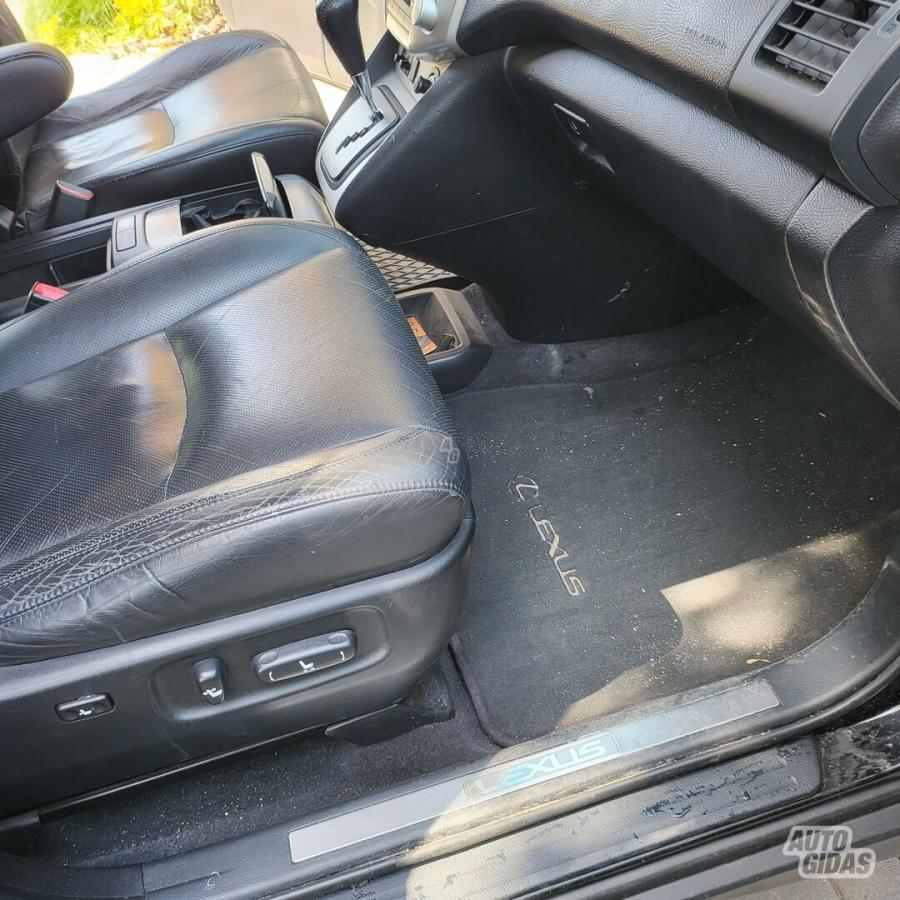 Black Lexus RX 400h 2009 in Trakai, with an engine capacity of 3.30 L and mileage of 343 thousand km for 7200 €, photo 14 on AUTOMOTO.COM.LV
