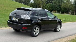 Black Lexus RX 400h 2010 in Riga, with an engine capacity of 3.30 L and mileage of 333 thousand km for 4700 €, photo 5 on AUTOMOTO.COM.LV