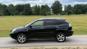 Black Lexus RX 400h 2010 in Riga, with an engine capacity of 3.30 L and mileage of 333 thousand km for 4700 €, photo 9 on AUTOMOTO.COM.LV