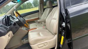 Black Lexus RX 400h 2010 in Riga, with an engine capacity of 3.30 L and mileage of 333 thousand km for 4700 €, photo 14 on AUTOMOTO.COM.LV