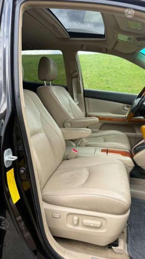 Black Lexus RX 400h 2010 in Riga, with an engine capacity of 3.30 L and mileage of 333 thousand km for 4700 €, photo 18 on AUTOMOTO.COM.LV