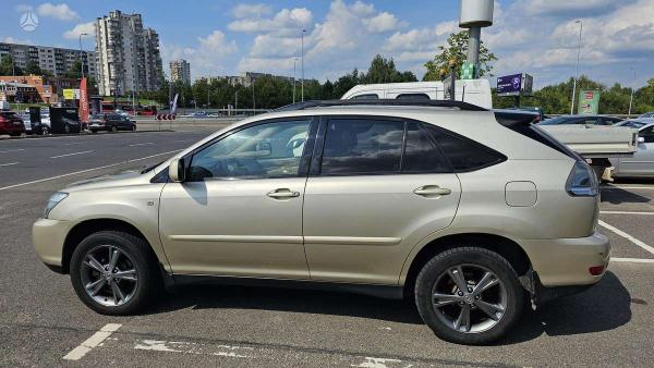 Brūns Lexus RX 400h 2006 Viļņa, ar dzinēja tilpumu 3.31 L un nobraukumu 305 tūkst. km par 6000 €, foto 1 vietnē AUTOMOTO.COM.LV