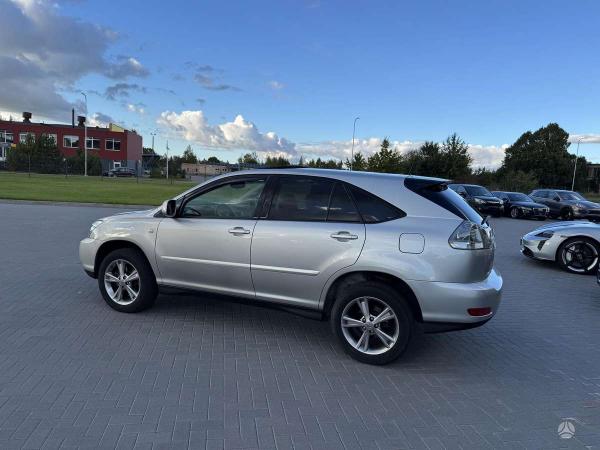 Lexus RX 400h 2006 in Telschi on AUTOMOTO.COM.LV Grey Lexus RX 400h 2006 in Telschi, with an engine capacity of 3.31 L and mileage of 251 thousand km for 6700 €, photo 4 on AUTOMOTO.COM.LV