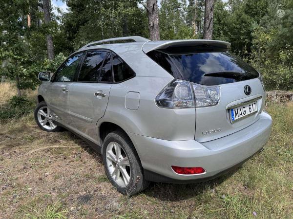 Pelēks Lexus RX 400h 2010 Trakai, ar dzinēja tilpumu 3.31 L un nobraukumu 400 tūkst. km par 7150 €, foto 4 vietnē AUTOMOTO.COM.LV