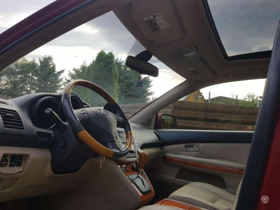 Red Lexus RX 400h 2008 in Vilnius, with an engine capacity of 3.31 L and mileage of 261 thousand km for 7500 €, photo 5 on AUTOMOTO.COM.LV
