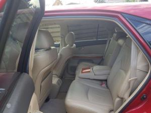 Red Lexus RX 400h 2008 in Vilnius, with an engine capacity of 3.31 L and mileage of 261 thousand km for 7500 €, photo 7 on AUTOMOTO.COM.LV