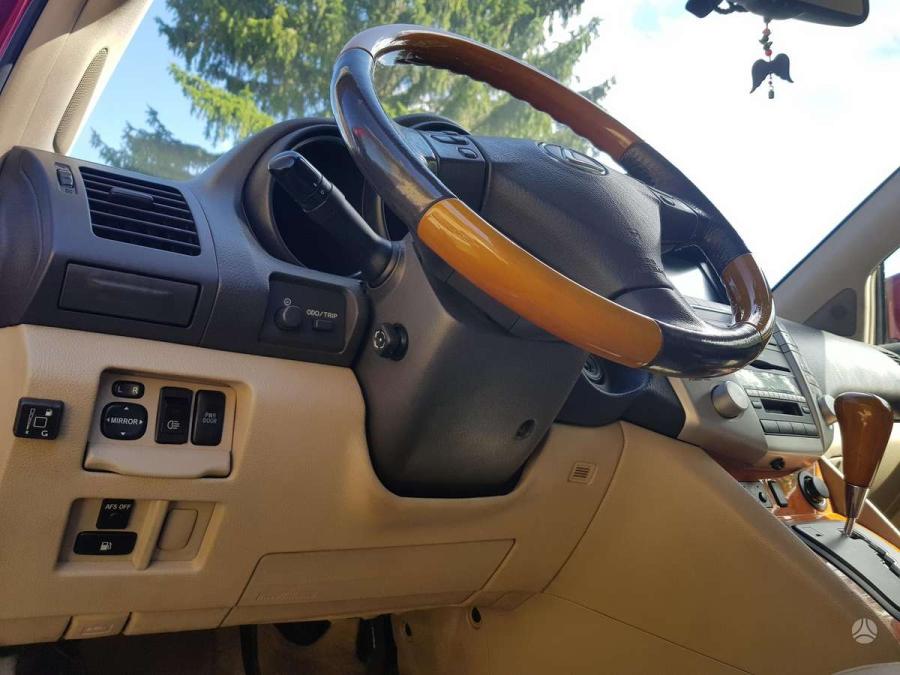 Red Lexus RX 400h 2008 in Vilnius, with an engine capacity of 3.31 L and mileage of 261 thousand km for 7500 €, photo 17 on AUTOMOTO.COM.LV