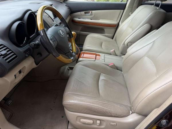 Red Lexus RX 400h 2008 in Vilnius, with an engine capacity of 3.31 L and mileage of 199 thousand km for 8999 €, photo 9 on AUTOMOTO.COM.LV
