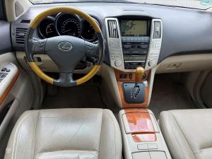 Red Lexus RX 400h 2008 in Vilnius, with an engine capacity of 3.31 L and mileage of 199 thousand km for 8999 €, photo 10 on AUTOMOTO.COM.LV