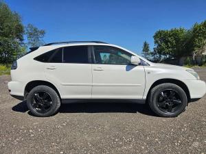 White Lexus RX 400h 2006 in Kaunas, with an engine capacity of 3.30 L and mileage of 361 thousand km for 4750 €, photo 8 on AUTOMOTO.COM.LV