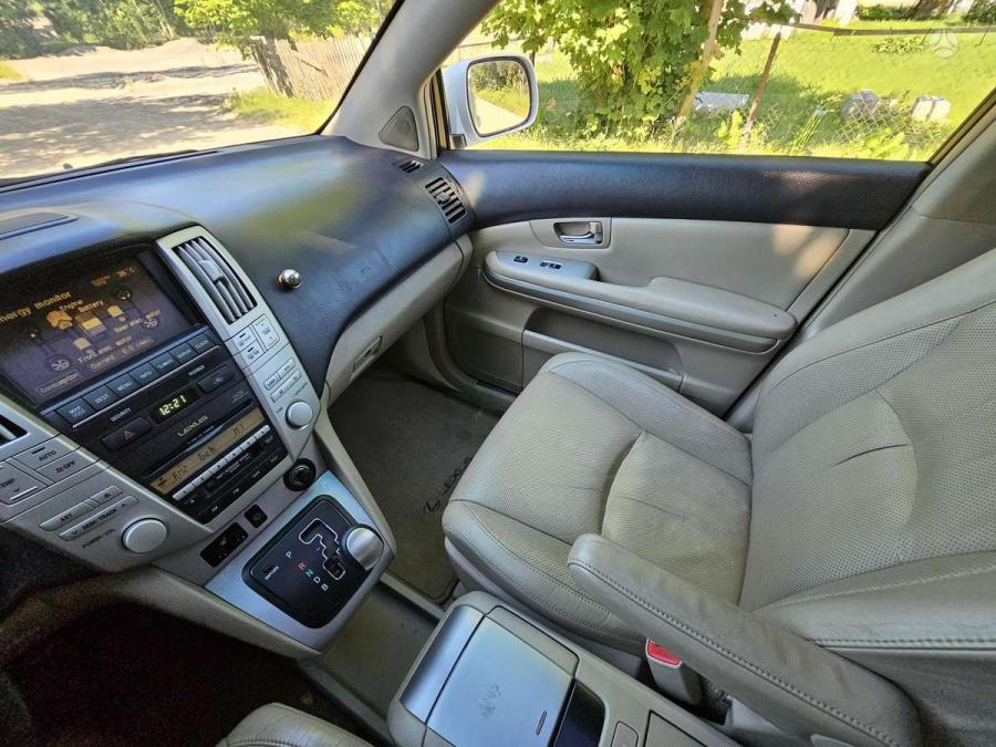 White Lexus RX 400h 2006 in Kaunas, with an engine capacity of 3.30 L and mileage of 361 thousand km for 4750 €, photo 27 on AUTOMOTO.COM.LV