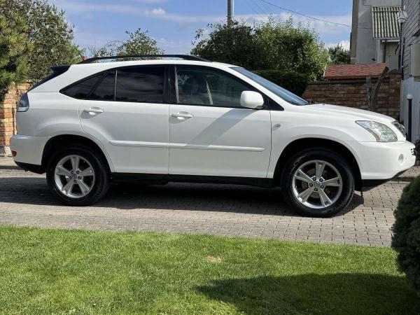 Лексус RX 400h 2006 в Шяуляй на AUTOMOTO.COM.LV Белый Лексус RX 400h 2006 в Шяуляй, объемом двигателя 3.31 л и пробегом 305 тыс. км за 5100 €, фото 4 на AUTOMOTO.COM.LV