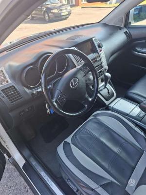 White Lexus RX 400h 2007 in Jonava, with an engine capacity of 3.31 L and mileage of 330 thousand km for 7200 €, photo 6 on AUTOMOTO.COM.LV