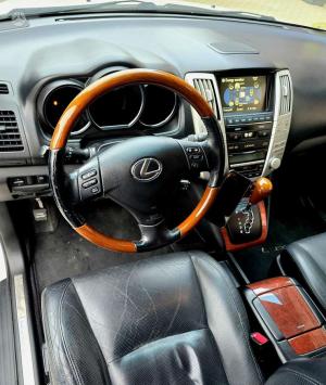 Balts Lexus RX 400h 2009 Tauragė, ar dzinēja tilpumu 3.30 L un nobraukumu 301 tūkst. km par 7200 €, foto 24 vietnē AUTOMOTO.COM.LV