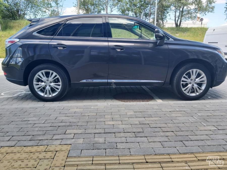 Black Lexus RX 450h 2009 in Vilnius, with an engine capacity of 3.50 L and mileage of 238 thousand km for 12400 €, photo 5 on AUTOMOTO.COM.LV