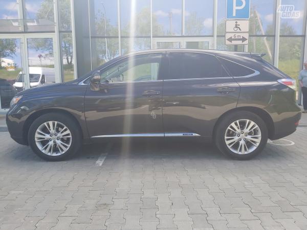 Black Lexus RX 450h 2009 in Vilnius, with an engine capacity of 3.50 L and mileage of 238 thousand km for 12400 €, photo 7 on AUTOMOTO.COM.LV