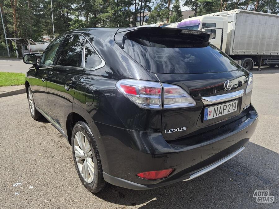 Black Lexus RX 450h 2011 in Trakai, with an engine capacity of 3.50 L and mileage of 415 thousand km for 11800 €, photo 5 on AUTOMOTO.COM.LV