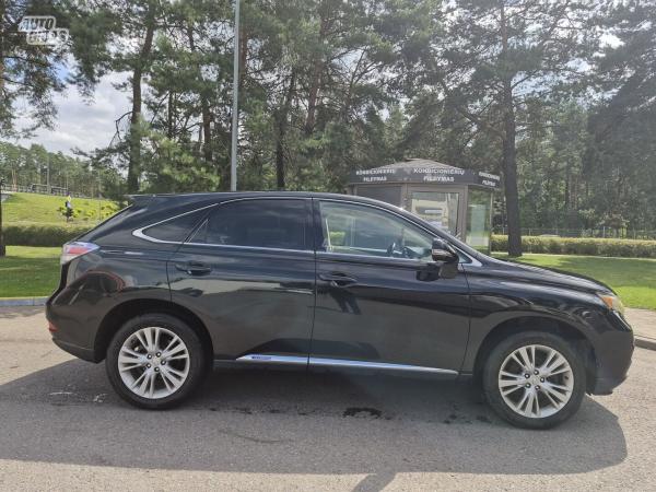 Black Lexus RX 450h 2011 in Trakai, with an engine capacity of 3.50 L and mileage of 415 thousand km for 11800 €, photo 5 on AUTOMOTO.COM.LV