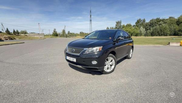 Black Lexus RX 450h 2011 in Vilnius, with an engine capacity of 3.46 L and mileage of 292 thousand km for 11300 €, photo 1 on AUTOMOTO.COM.LV