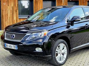 Black Lexus RX 450h 2011 in Taurage, with an engine capacity of 3.46 L and mileage of 290 thousand km for 6400 €, photo 11 on AUTOMOTO.COM.LV