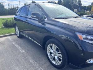 Black Lexus RX 450h 2011 in Vilnius, with an engine capacity of 3.46 L and mileage of 185 thousand km for 13900 €, photo 6 on AUTOMOTO.COM.LV