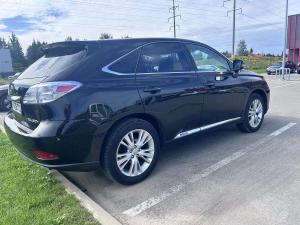 Black Lexus RX 450h 2011 in Vilnius, with an engine capacity of 3.46 L and mileage of 185 thousand km for 13900 €, photo 7 on AUTOMOTO.COM.LV