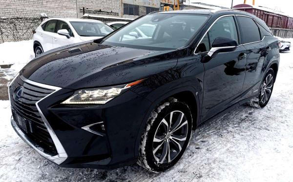 Black Lexus RX 450h 2016 in Vilnius, with an engine capacity of 3.46 L and mileage of 206 thousand km for 25700 €, photo 2 on AUTOMOTO.COM.LV